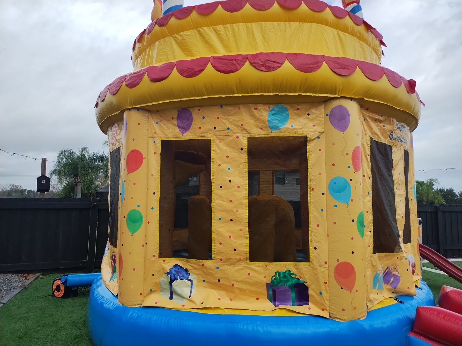 Birthday Cake Bounce House - Hire in FL | Gloria James Event Rentals