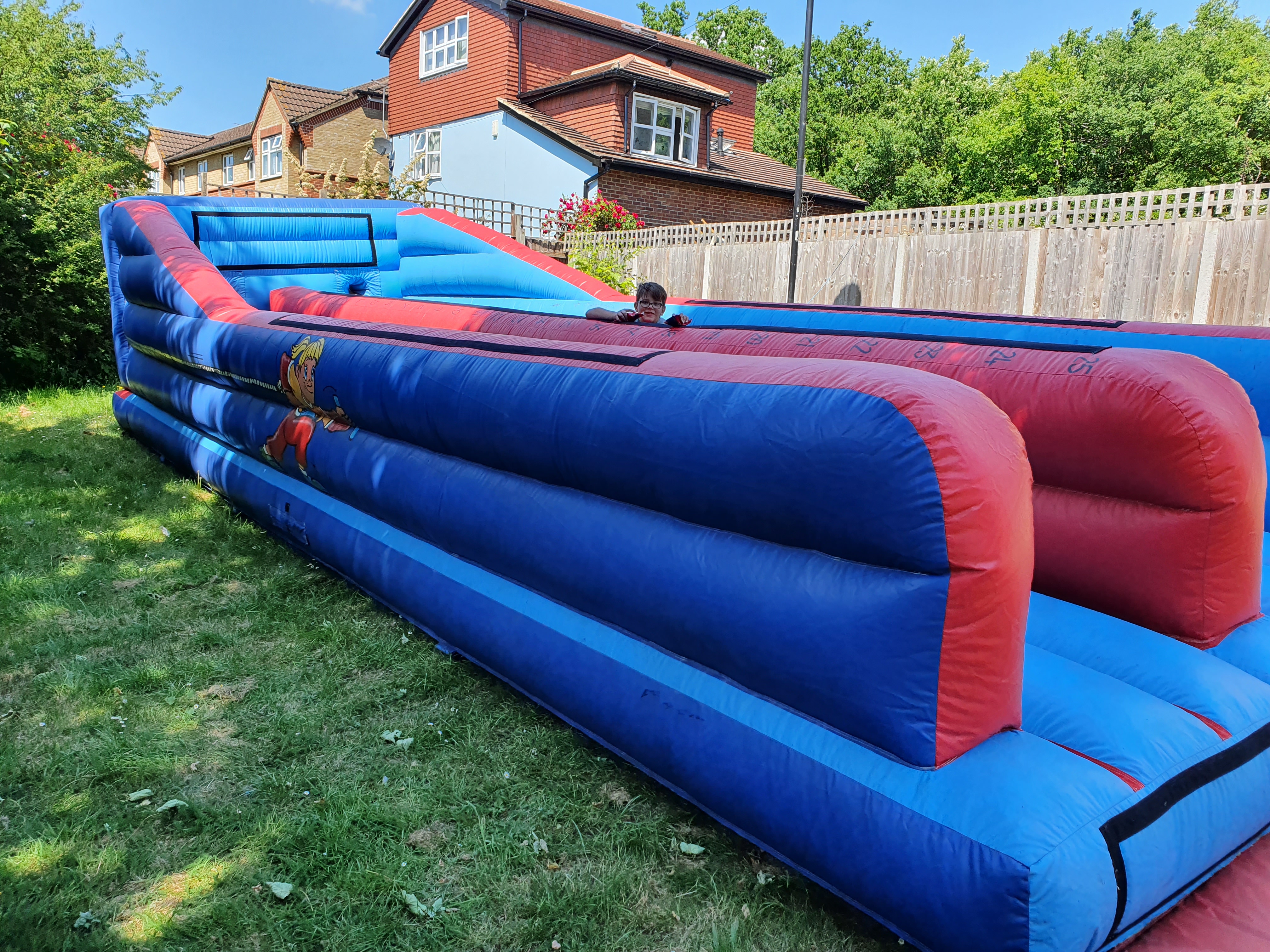 Deluxe 33ft Bungee Run. - Bouncy Castle Hire in London | Bouncing Bonkers