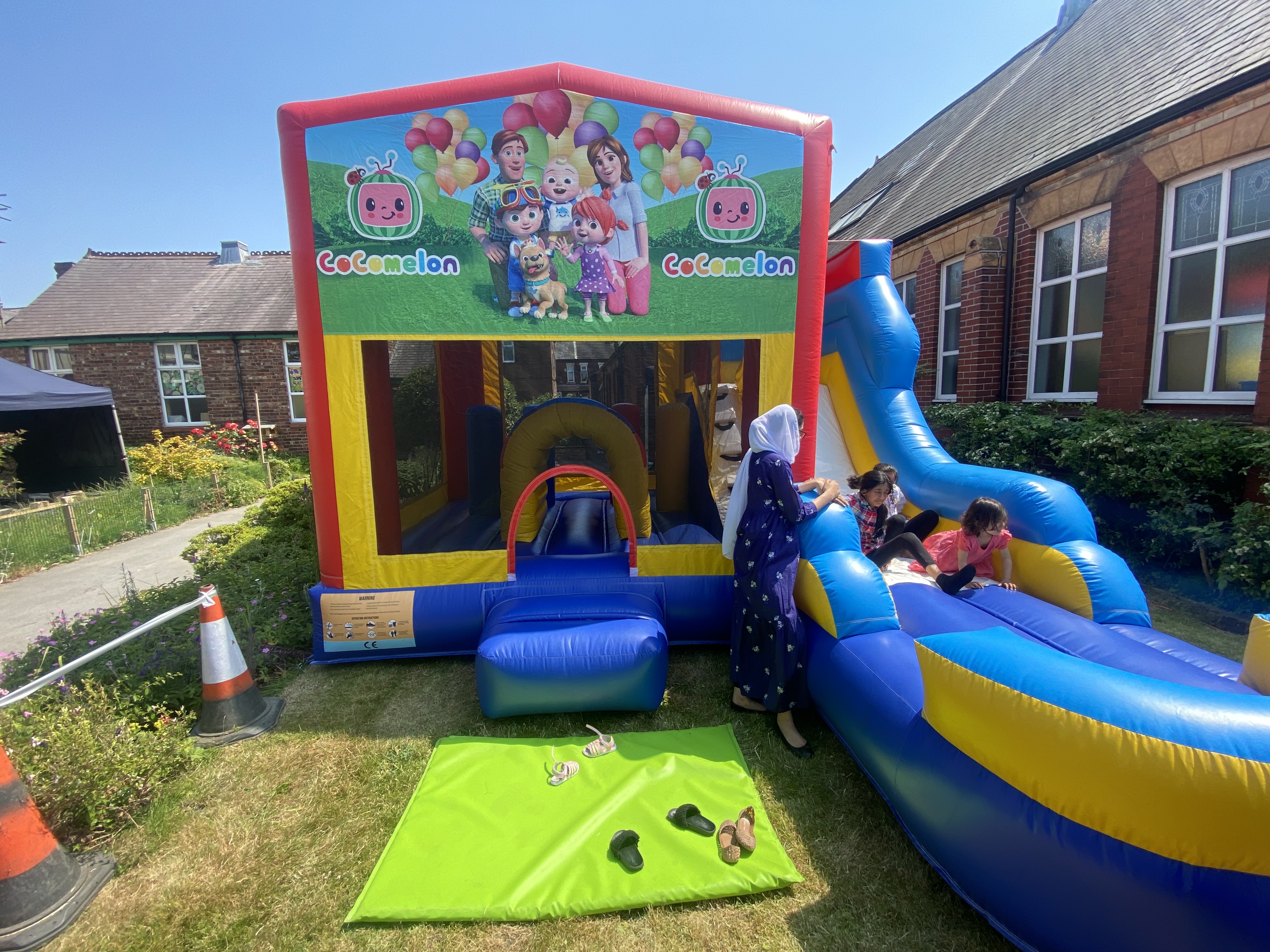 15ft X 17ft Coco Melon Bouncy Castle and slide - Bouncy Castle ...