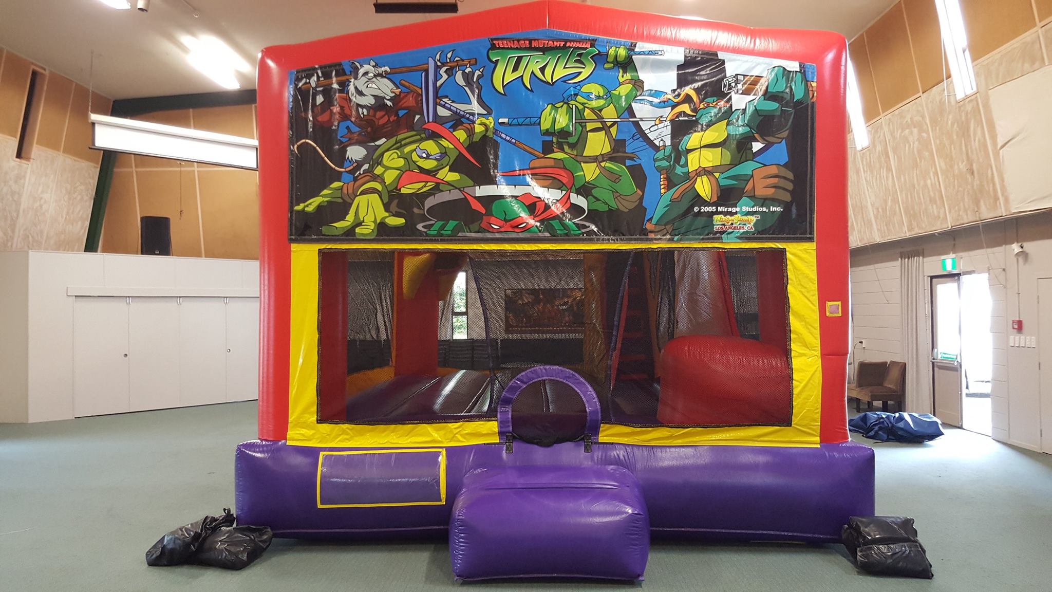 TEENAGE MUTANT NINJA TURTLES Jump N Slide Bouncy Castle - Hire in ...