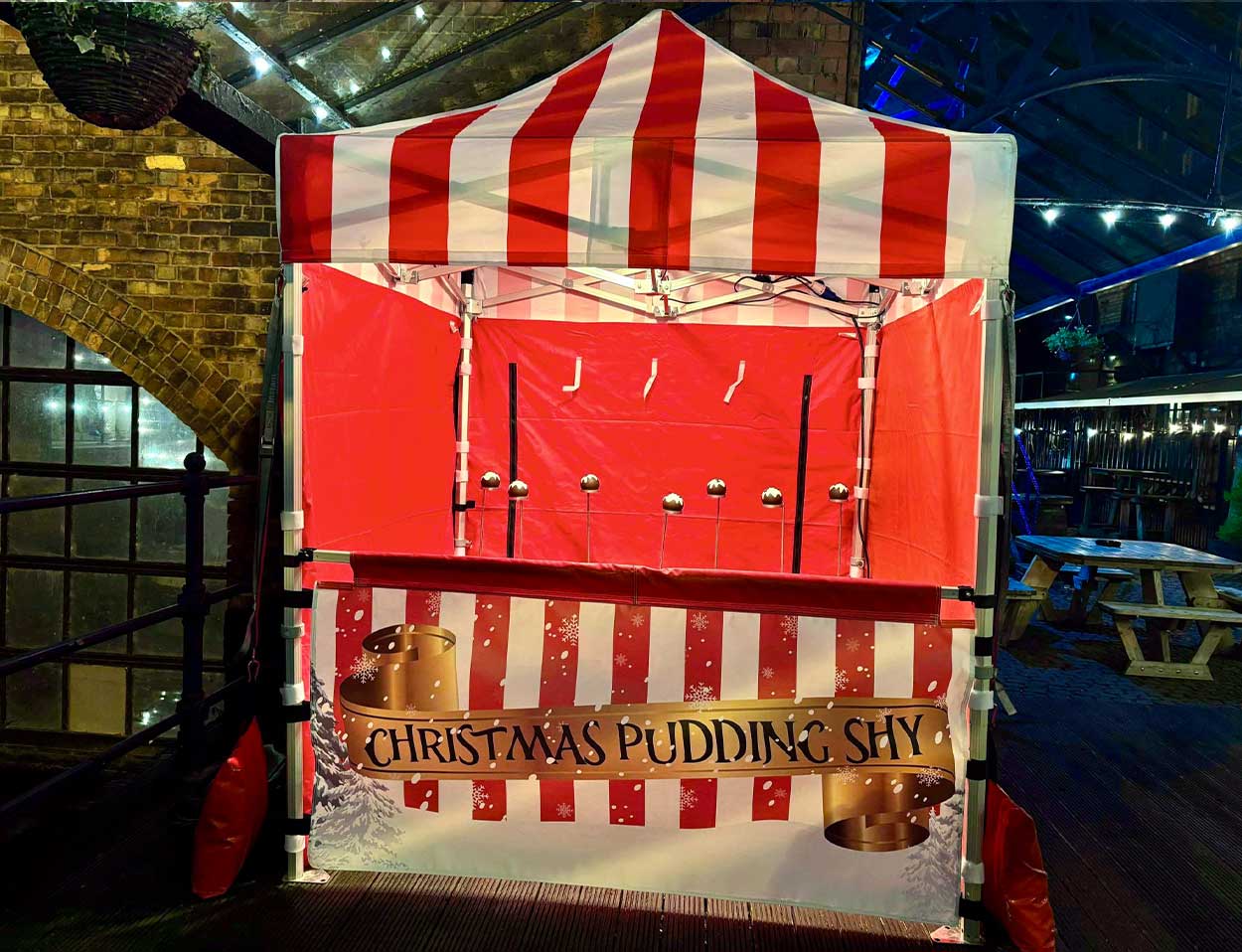 Side Stall Christmas Pudding Shy Hire | UK Entertainment Hire