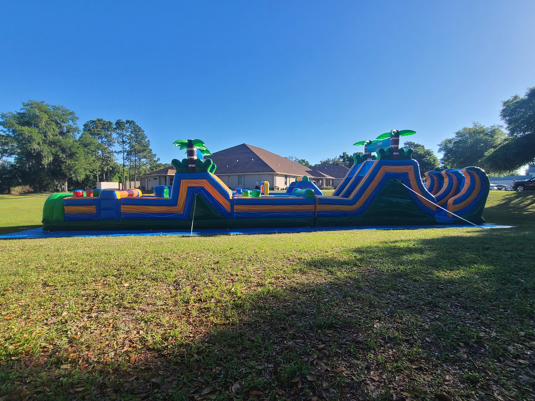 74' Jungle Rampage Obstacle Course with 15' Slide. Priced for the whole ...