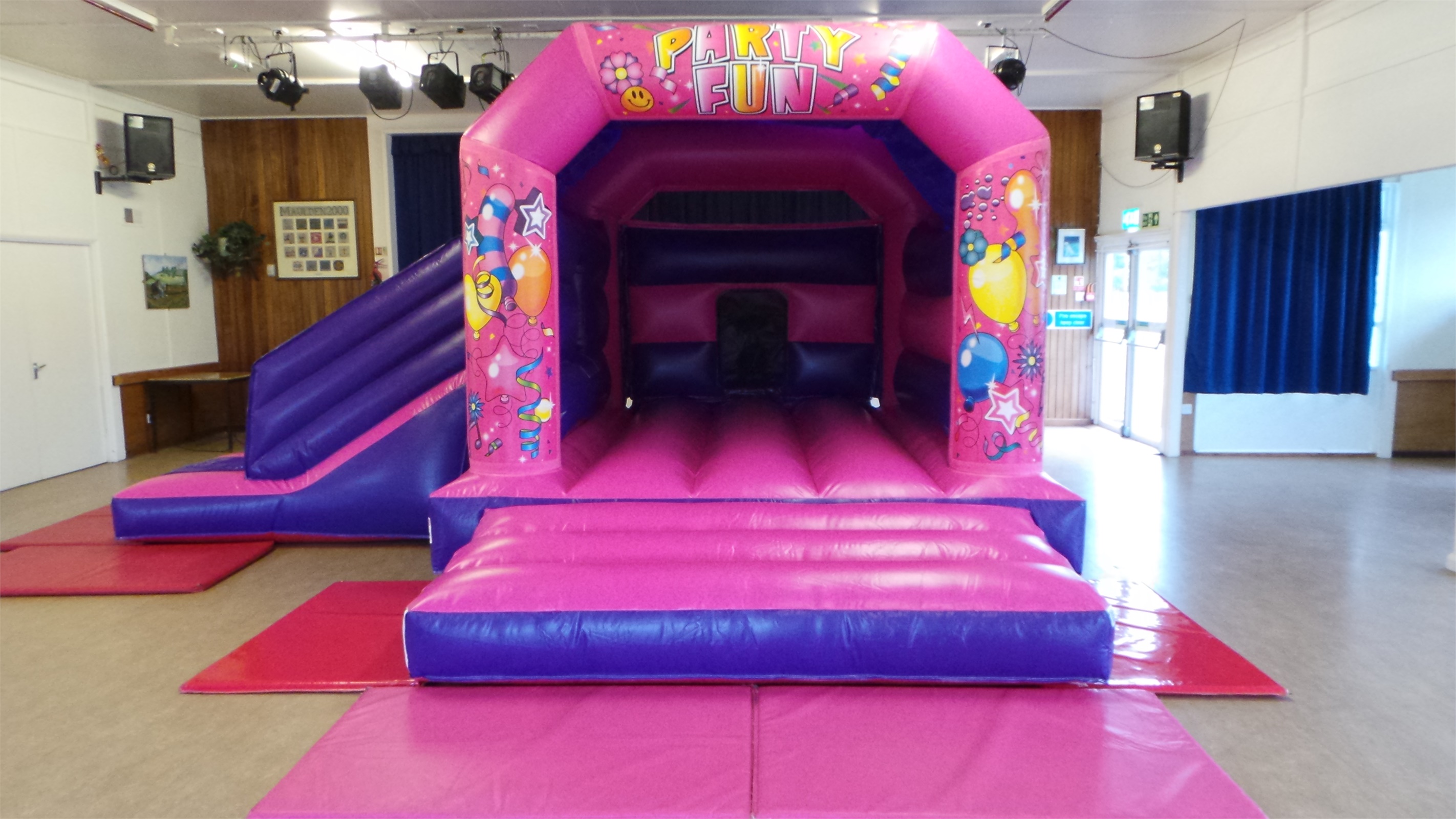 Pink & Purple Party Bouncy Castle with Slide Hire – Luton, Bedford, Mi