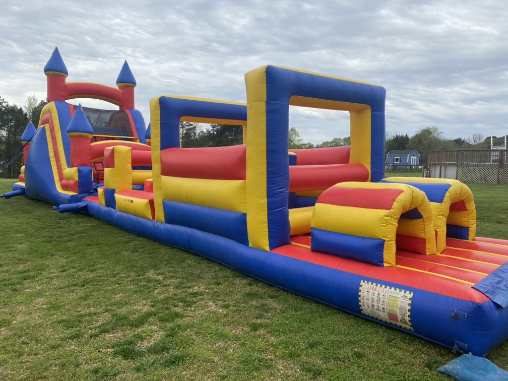 Morton Amusement Inflatables— obstacle and slide-renta
