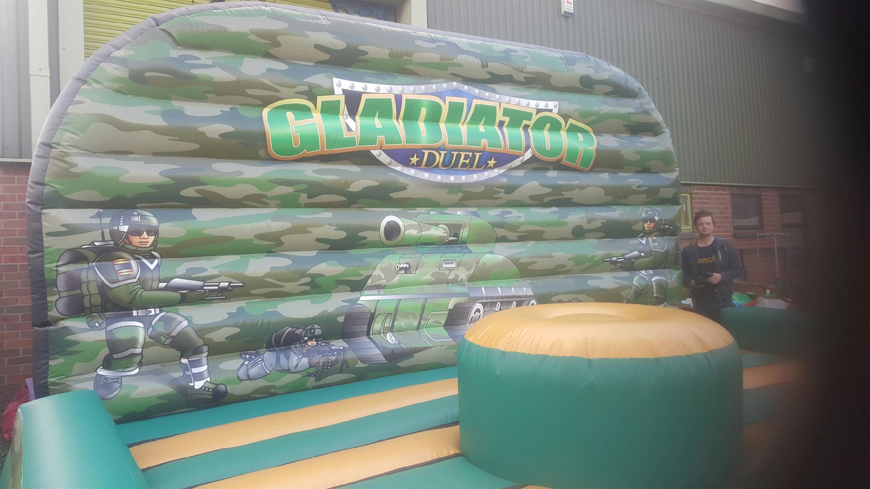 Army gladiator duel/Sticks - Best Bouncy Castles, Adult Bouncy Castle ...