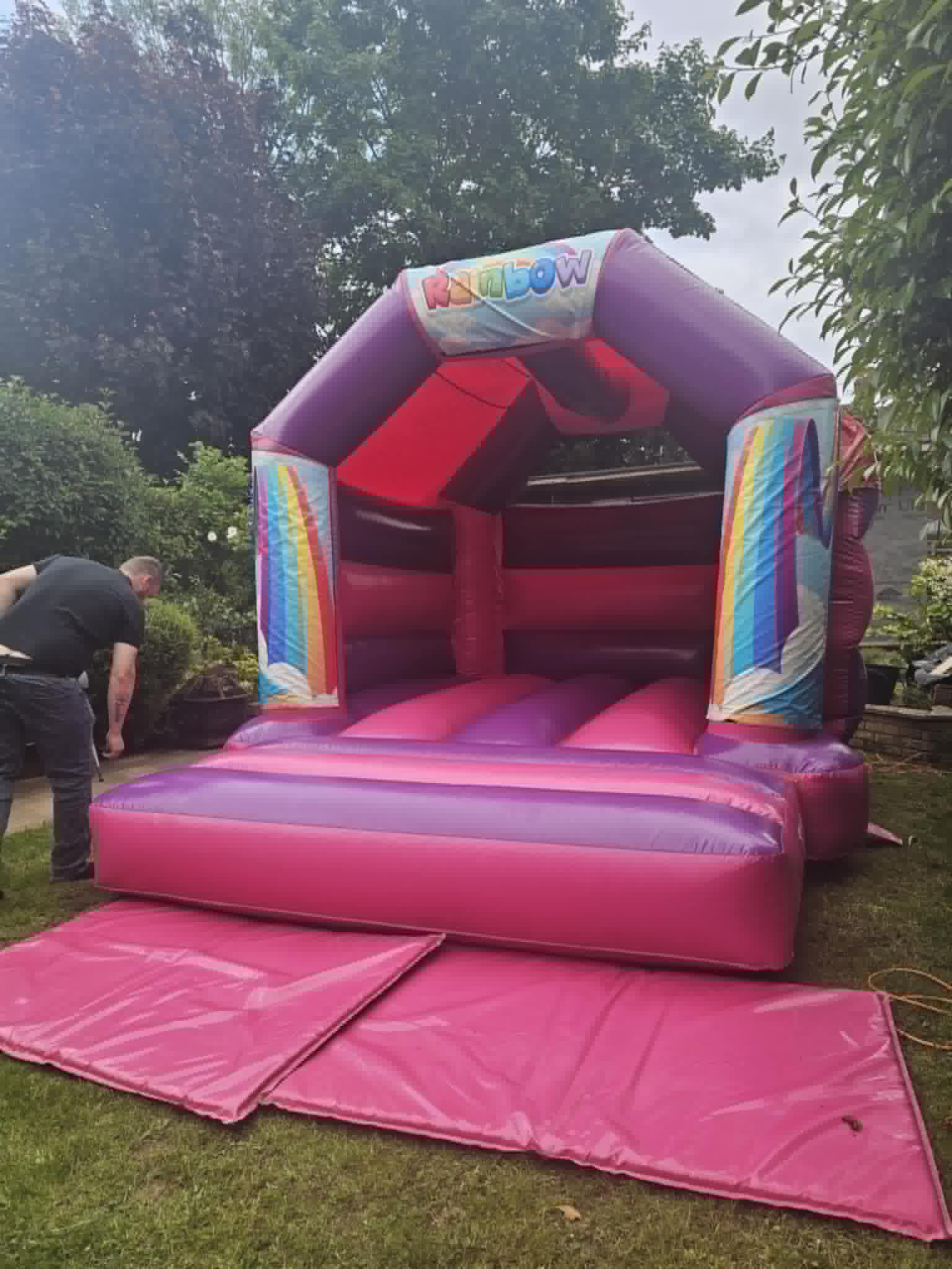 Pink / Purple Rainbow Castle - Inflatables Hire in London, greenwich ...