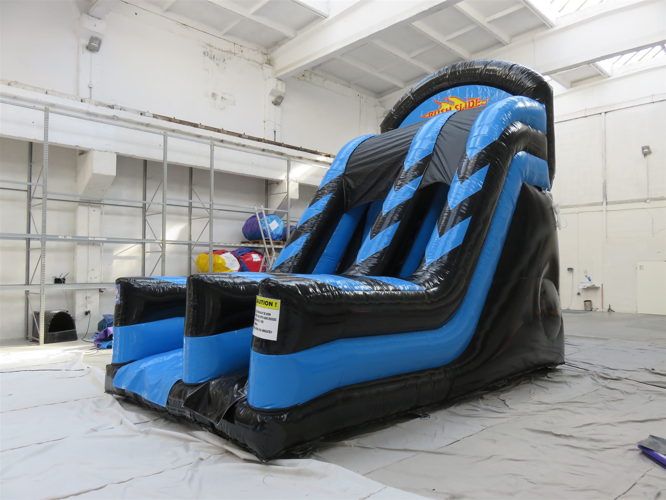 Inflatable Rush Slide Hire | Gloucester, Cheltenham, Tewkesbury