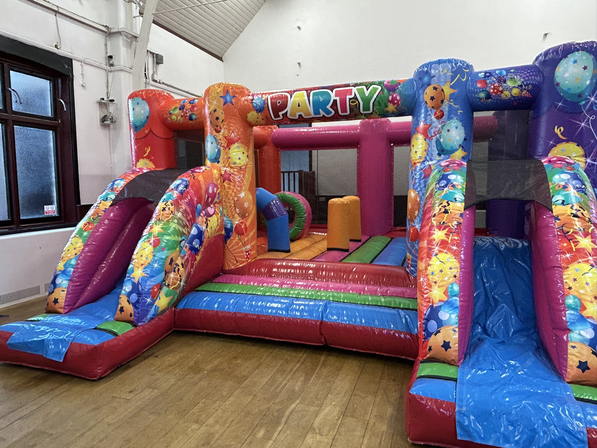Low Height slide bouncy castle hire
