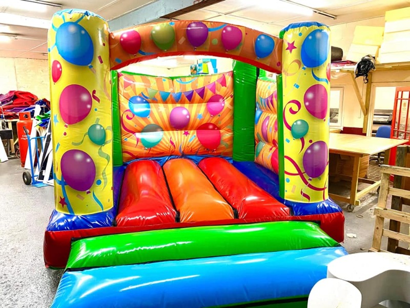 Multi Coloured Bouncy Castle - Hire in north east of east | Candy Kids ...