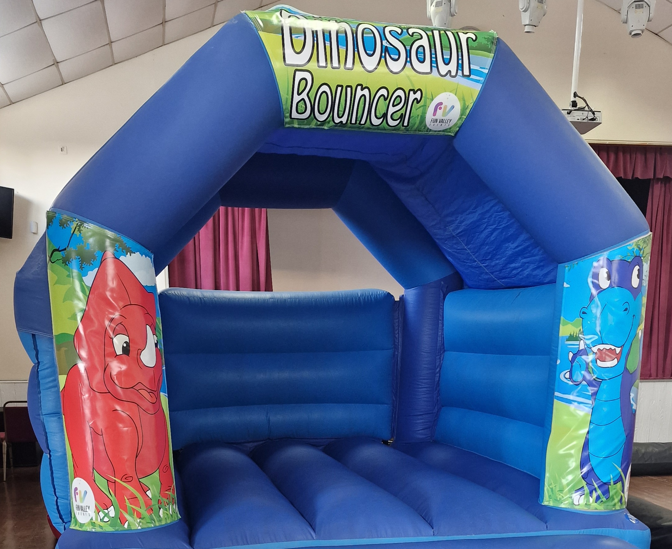 Dinosaur Themed Bouncy Castle with Slide ( 16ft x 15f - Hire in Preston