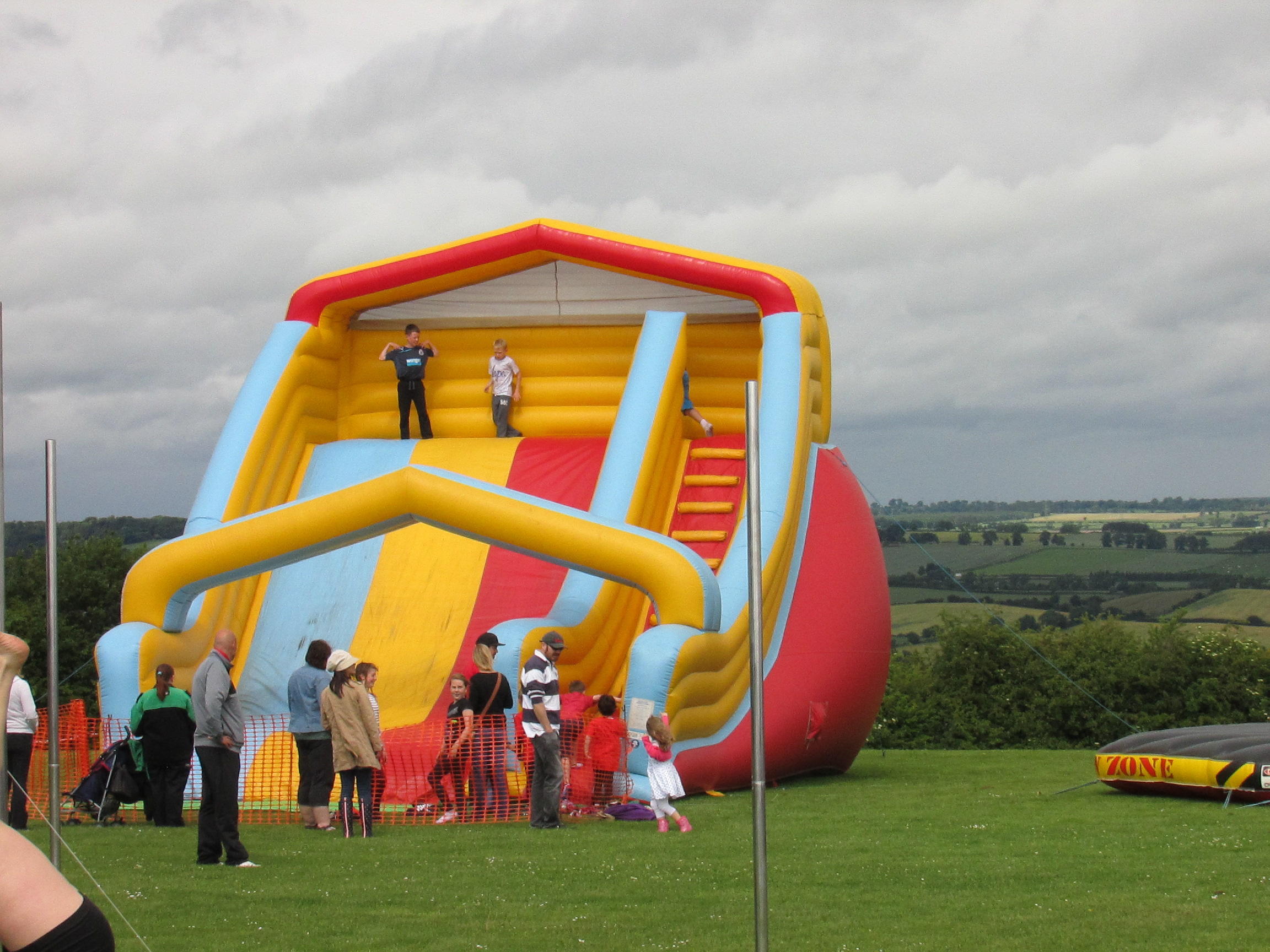 Giant Event Slide - Bouncy castle, inflatables, and entertainment Hire ...