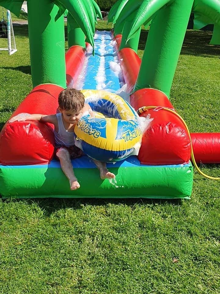 Water Slide Single Lane Inflatable 60ft x 9ft - Bouncy Castle Hire in ...