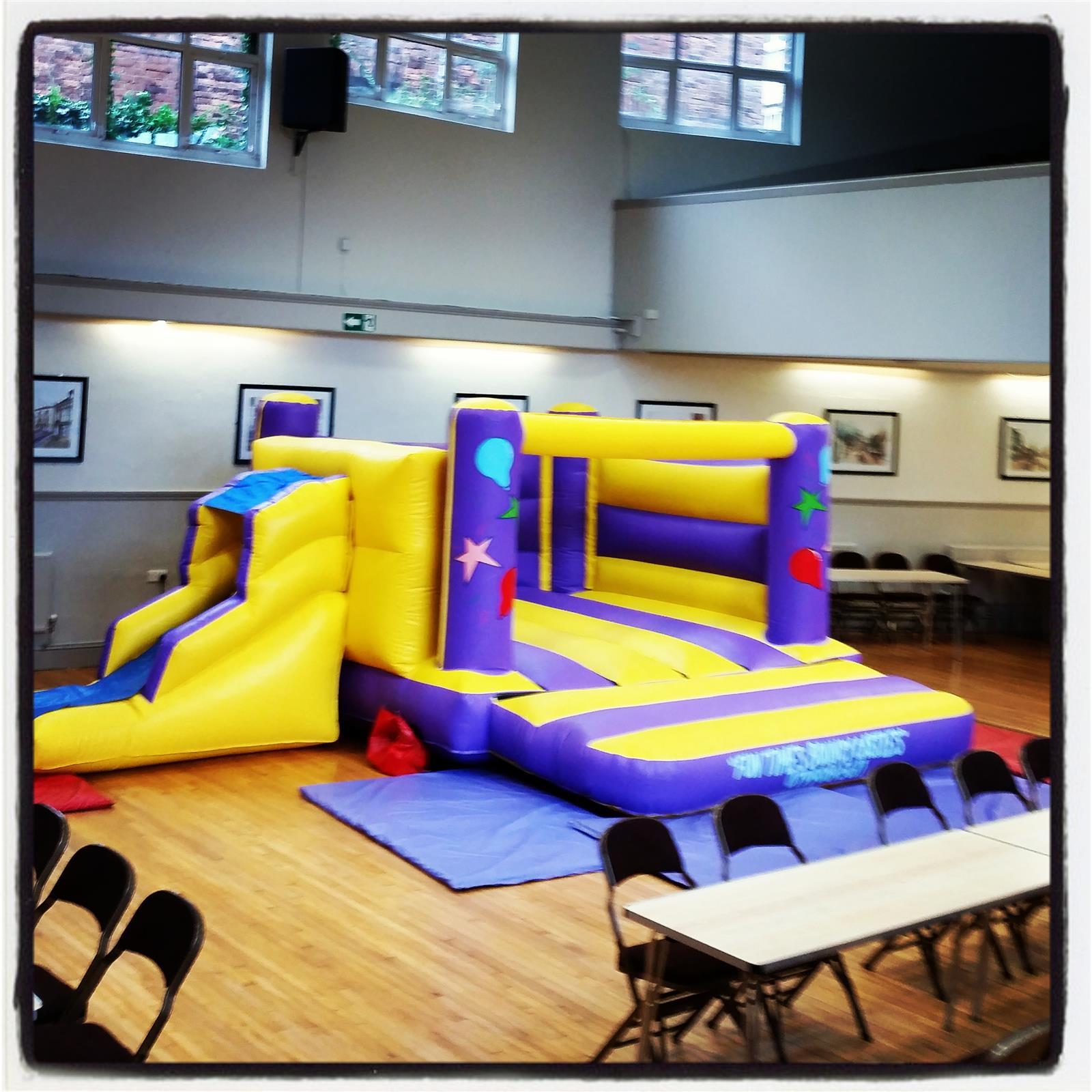 Pink & Yellow Bounce & Slide Bouncy Castle Hire in Swansea