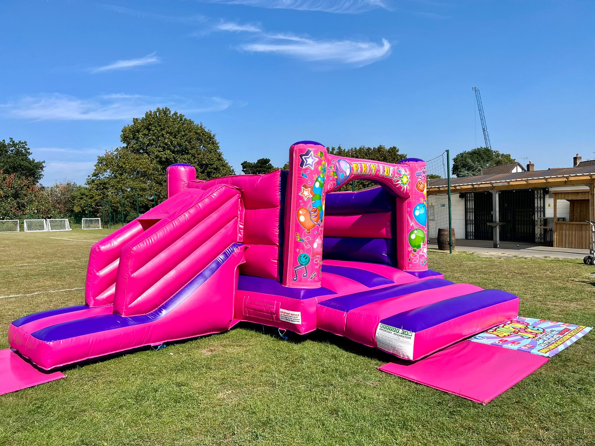 Low Height Party Fun Castle with Side Slide - Bouncy Castle Hire in ...