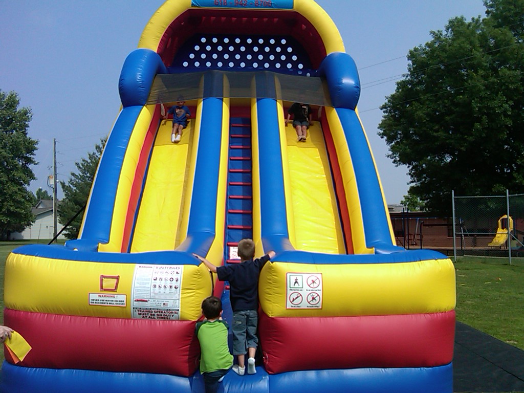 Rent a huge 20ft dual lane slide Inflatable - Book Online