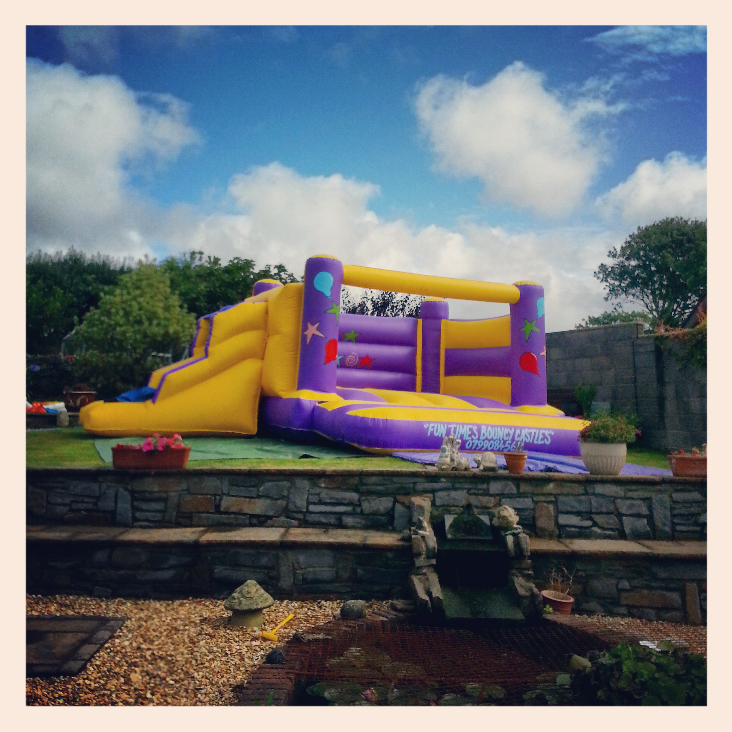 Pink & Yellow Bounce & Slide Bouncy Castle Hire Swansea