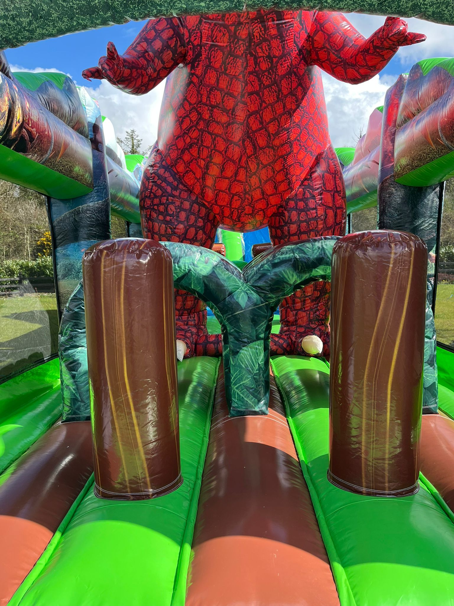 50ft Jurassic World High Slide Obstacle Course - Bouncy Castle Hire in ...