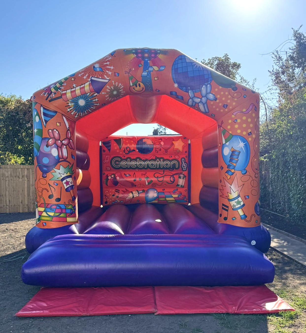 Celebration Castle Orange (14ft x 19ft) - Hire in Hersham, Walton on ...