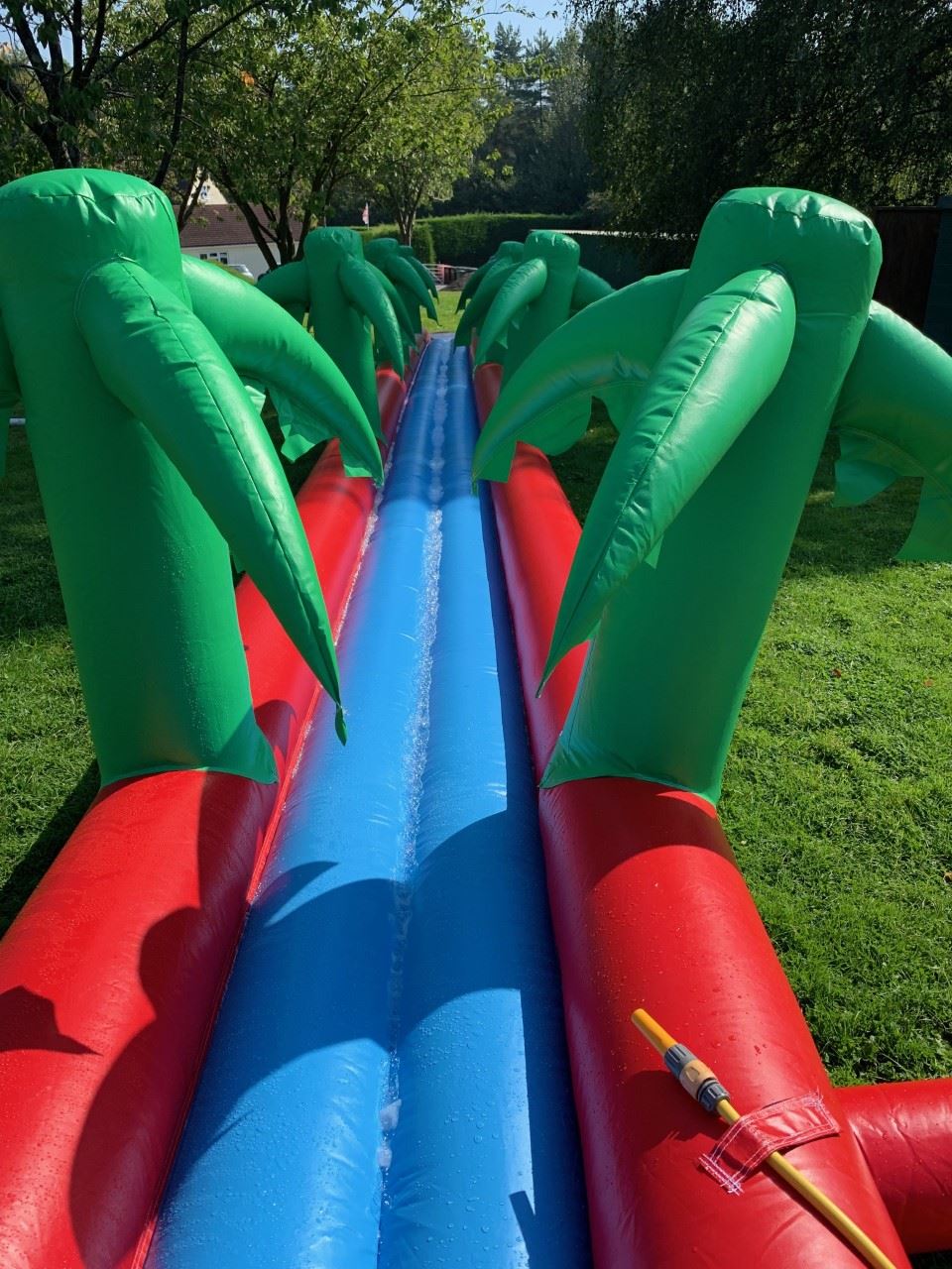 Water Slide Single Lane Inflatable 60ft x 9ft - Bouncy Castle Hire in ...