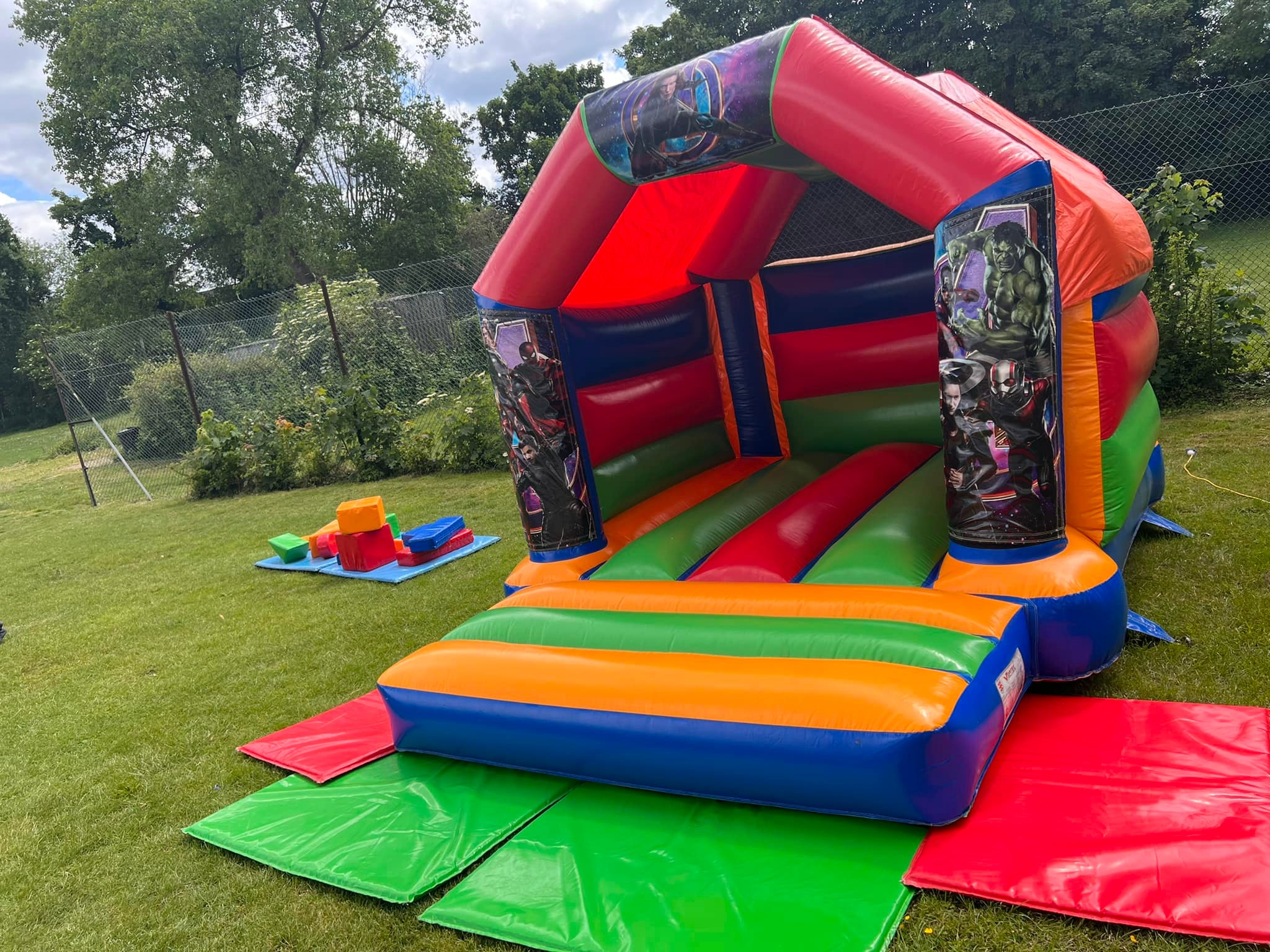 Multi Coloured Avengers Castle - Inflatables Hire in London, greenwich ...
