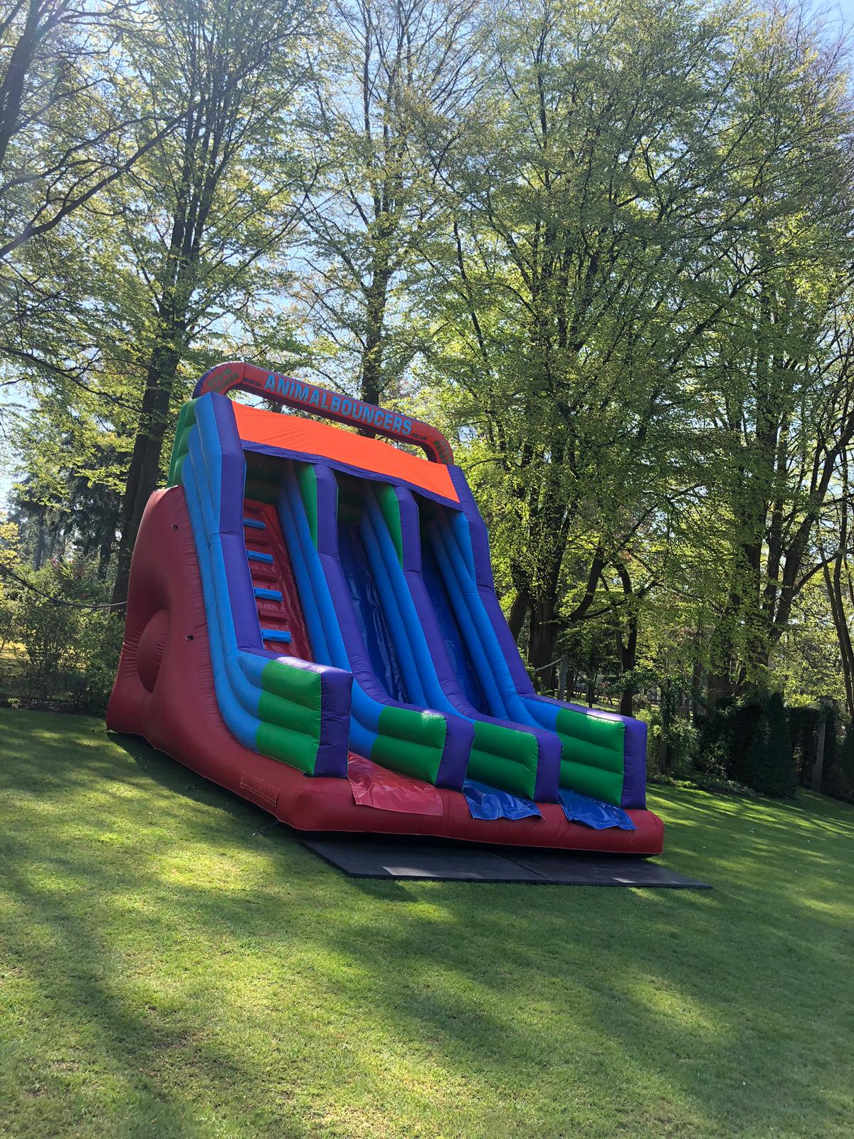 12ft Platform Twin Lane Rainbow Slide - Bouncy Castle Hire, Fairground ...