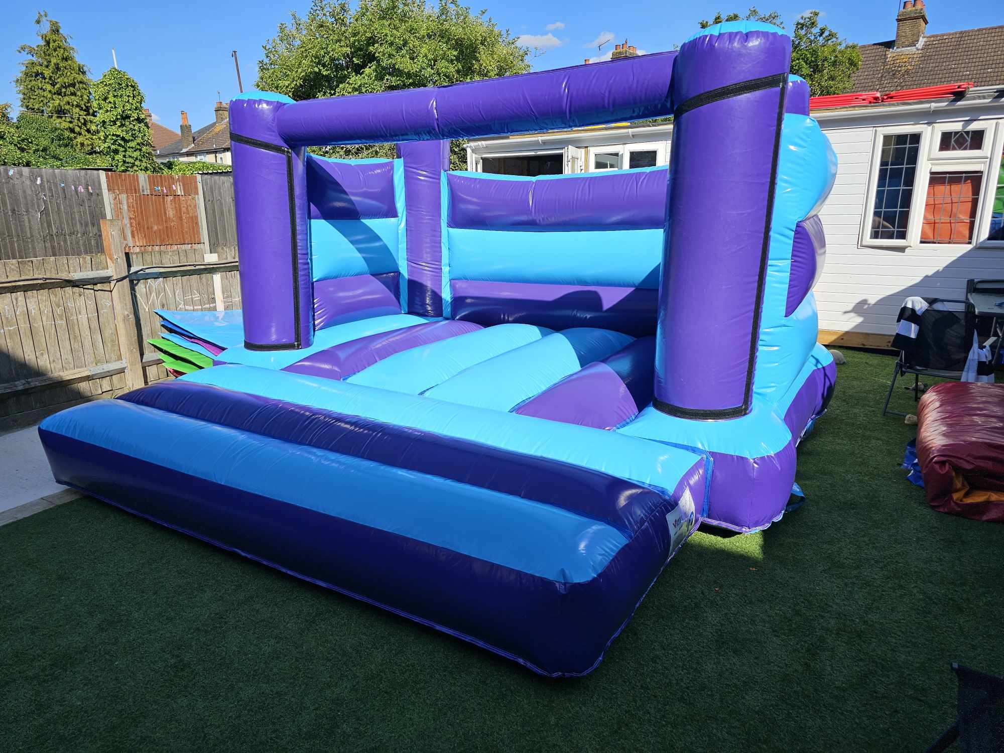 "12x12 Blue/Purple Bouncy Castle hire Greenwich