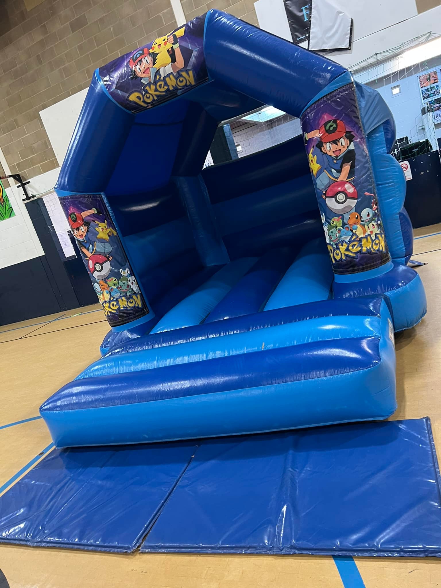 Light / Dark Blue Pokémon Castle - Inflatables Hire in London ...