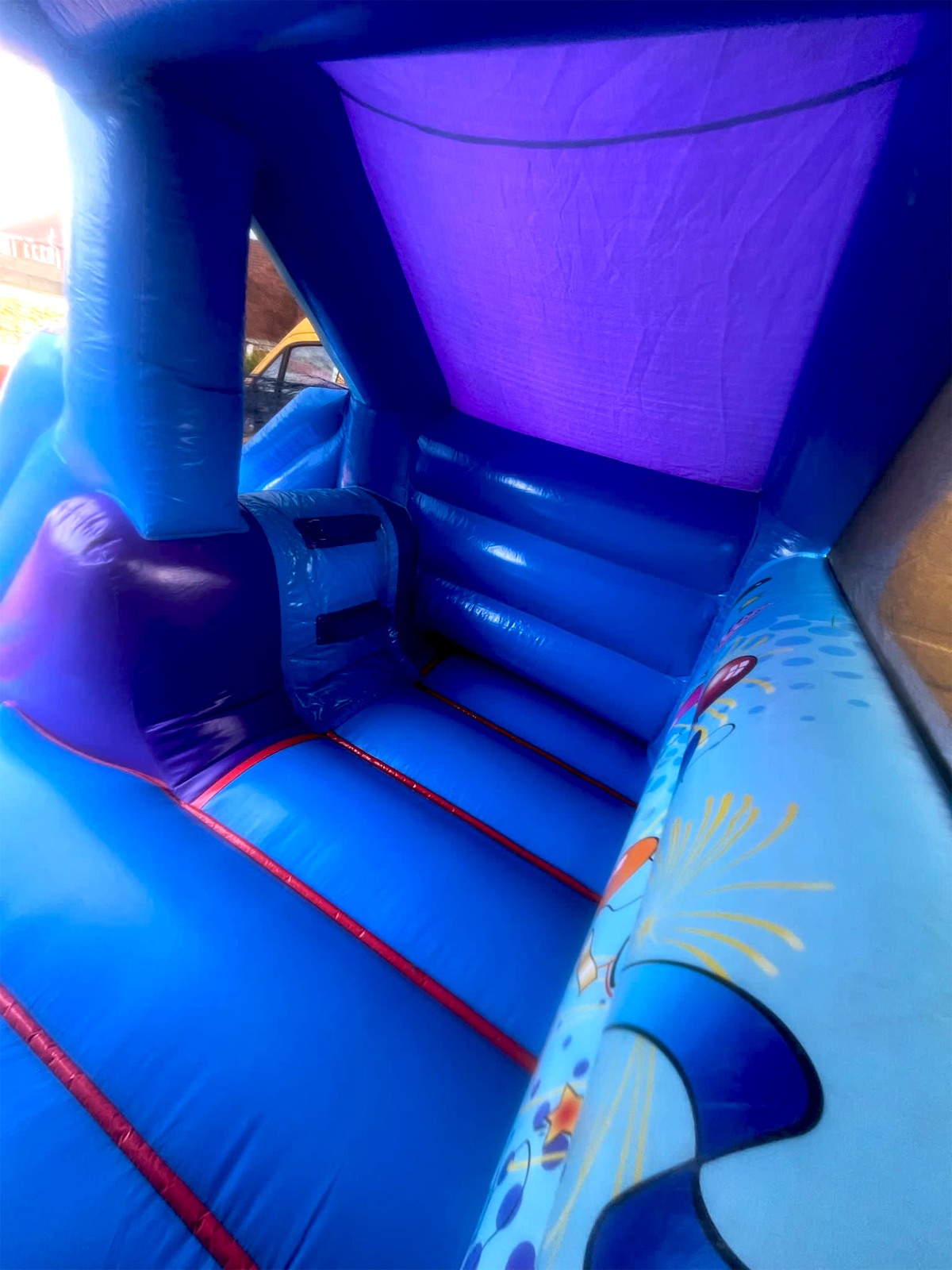 Celebration Front Slide Bouncy Castle Hire in Widnes and surrounding