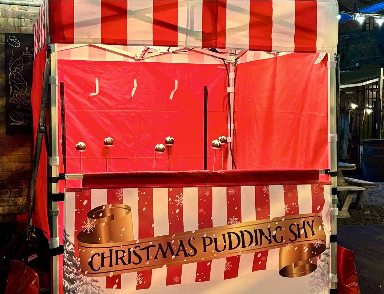 Side Stall Christmas Pudding Shy Hire | UK Entertainment Hire