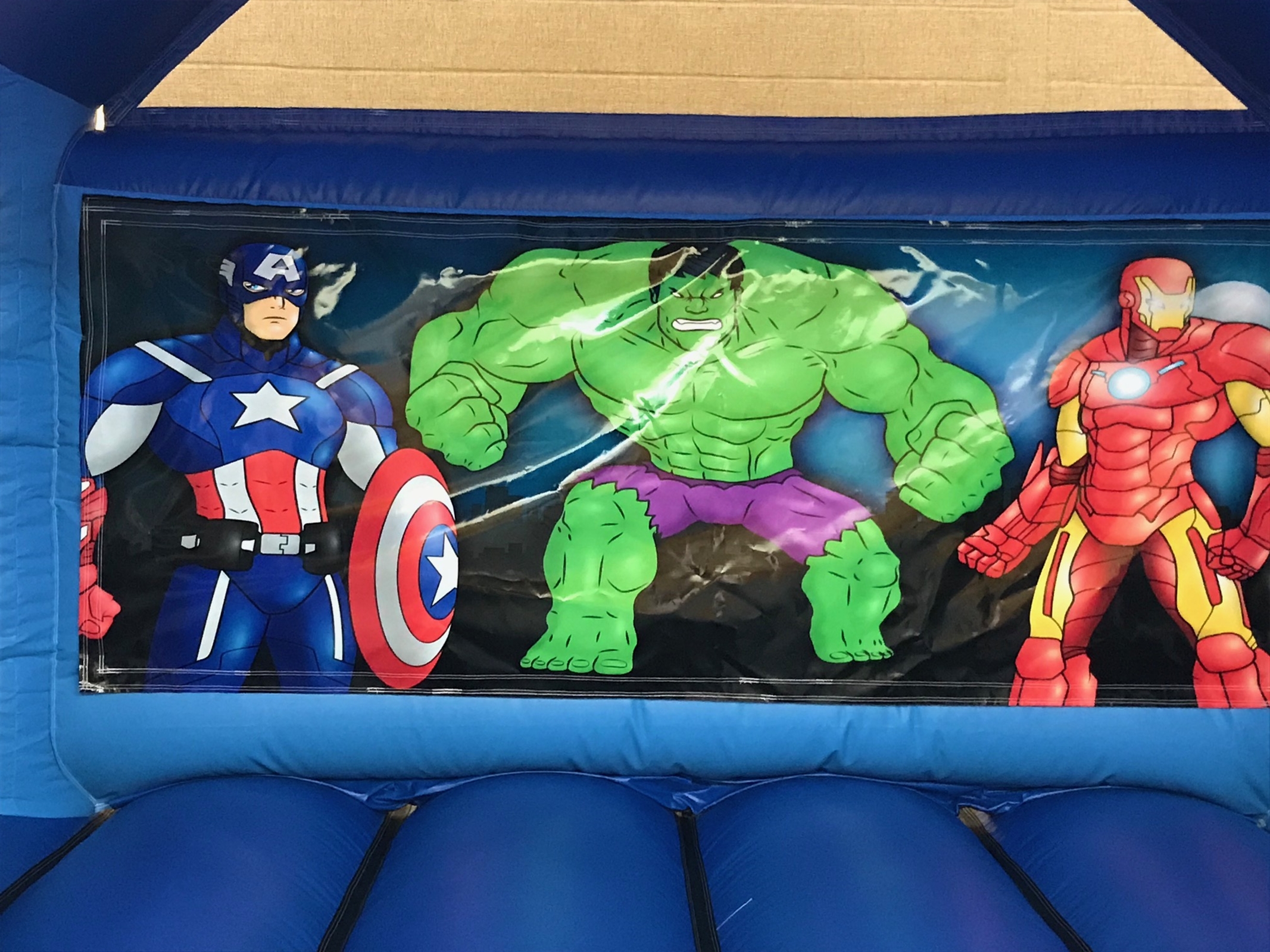 Superheroes Themed Bouncy Castle with Slide - Events & Inflatable Hire ...
