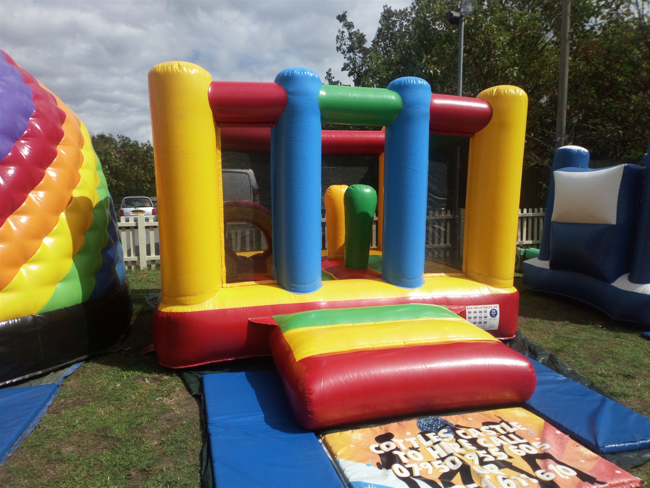 Rainbow Biff Bash Bouncy Castle | Romford, Ilford & Essex