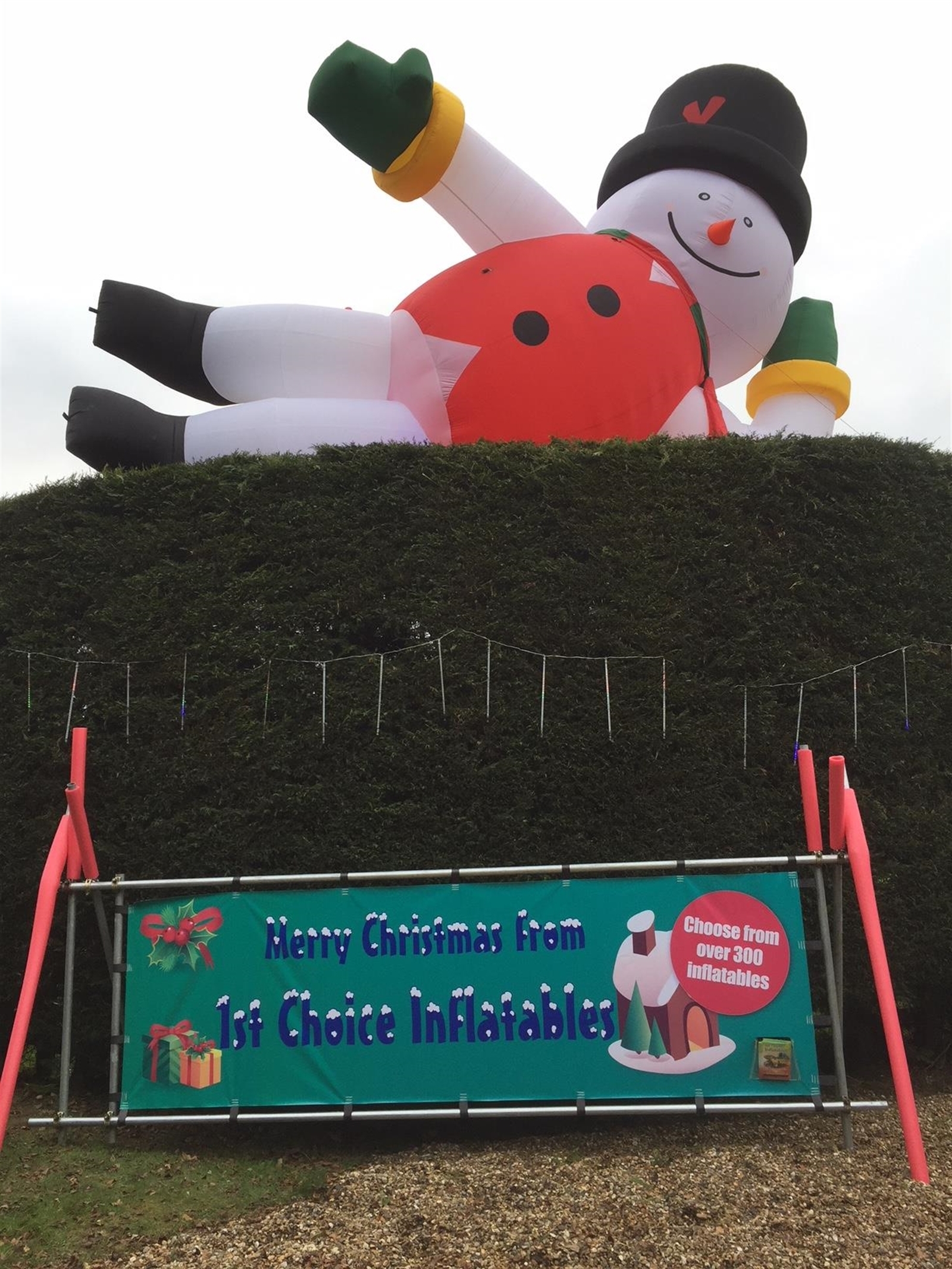 Relaxing Snowman Christmas Inflatable 26ft Wide - Bouncy Castle Hire in ...