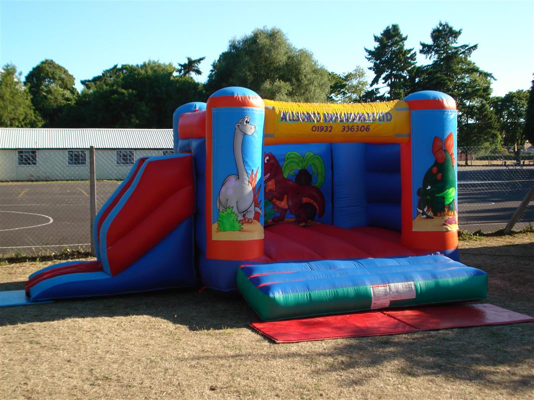 Dinosaur Castle/Slide Combo - Bouncy Castle Hire Surrey in Woking, Surrey