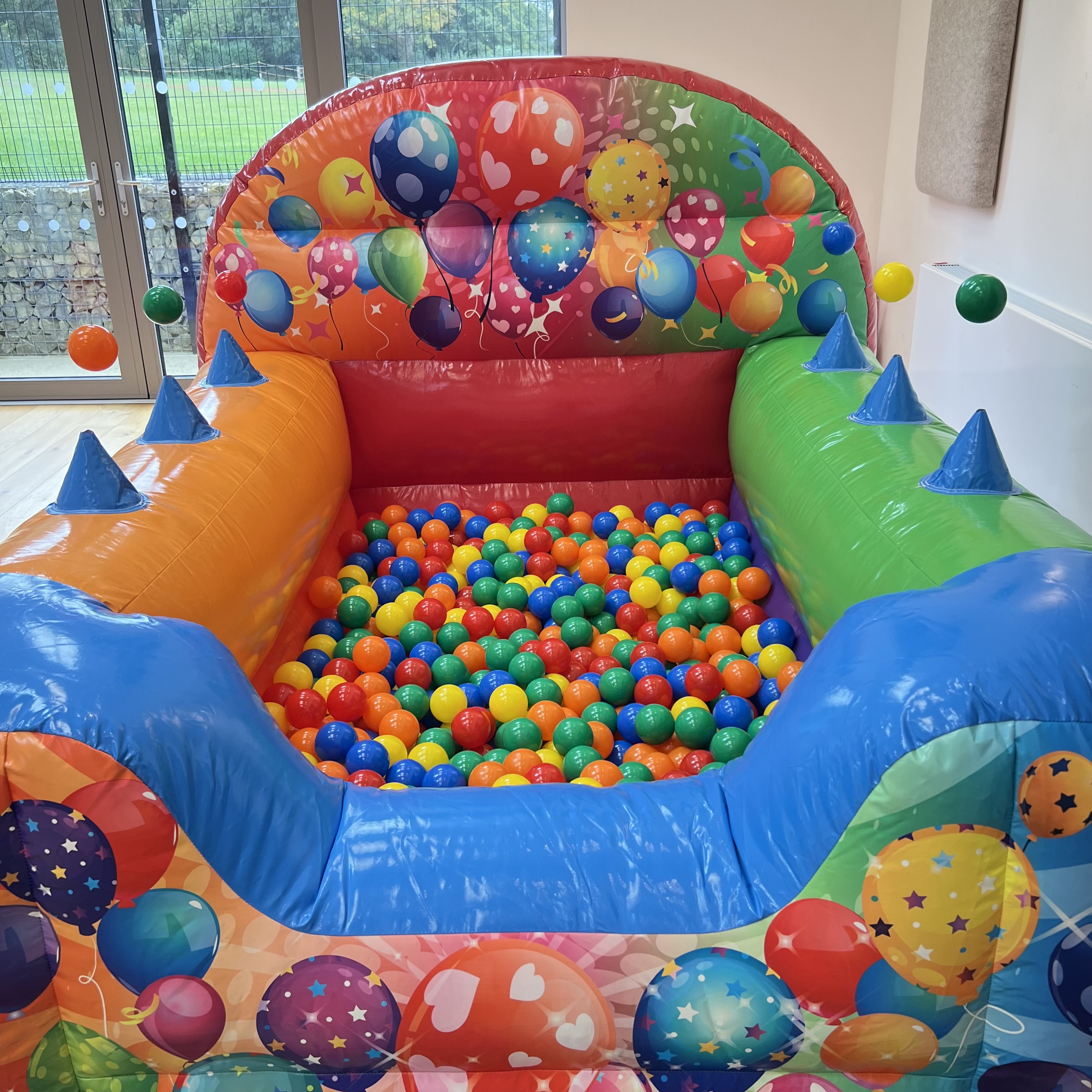 Multi Coloured Party Air Juggler Ball Pit - Bouncy Castle Hire in ...