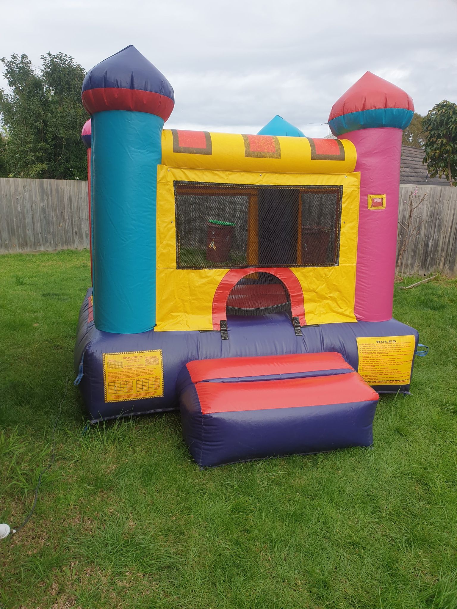 Colorful Fun Jumping Castle | Unisex Inflatable Hire | Melbourne Castl