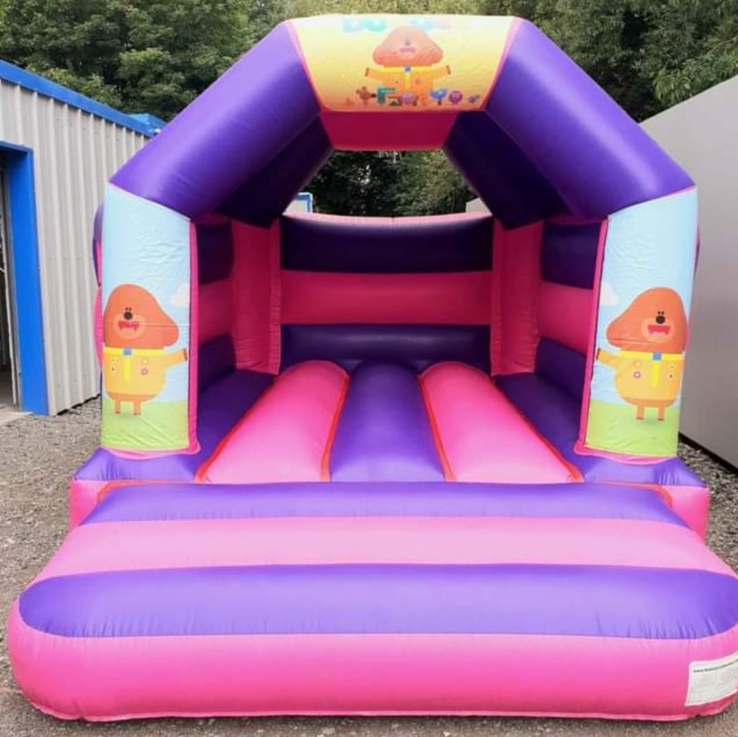 Purple and Pink Castle with Hey Duggee Artwork - Hire in Stoke On Trent ...