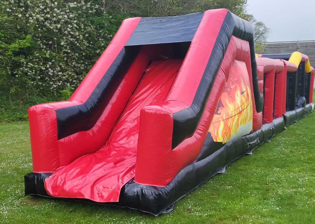Assault Course Inflatable Burning Flames theme 60ft x 10ft - Bouncy ...