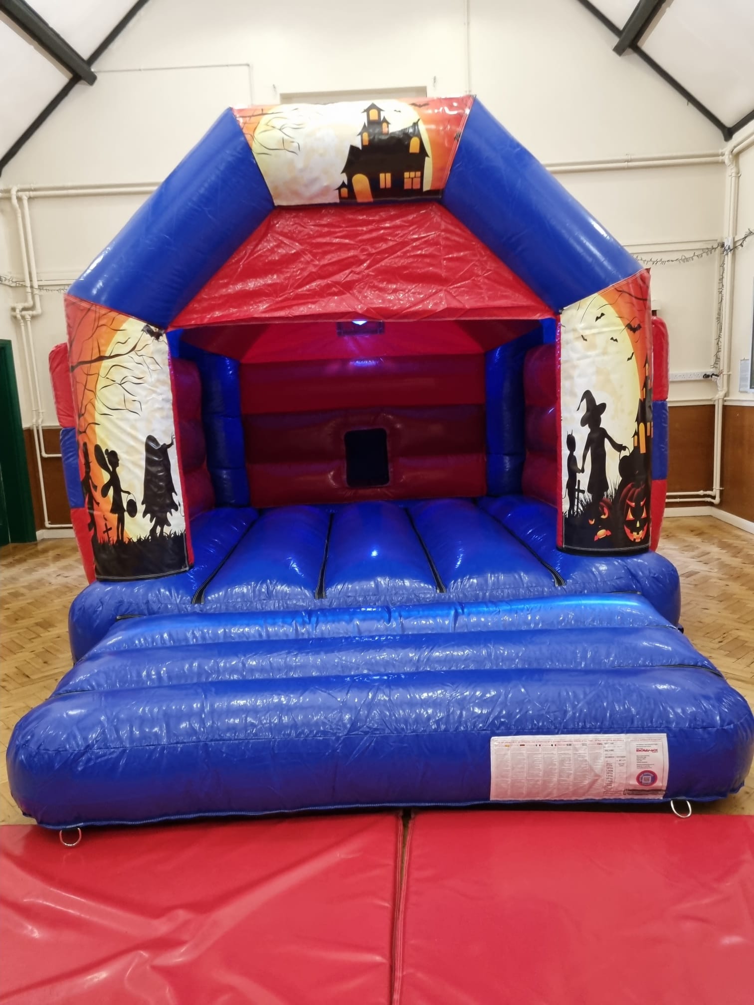 Red and Blue Bouncy Castle with Party Theme of your Choice - Event Hire ...