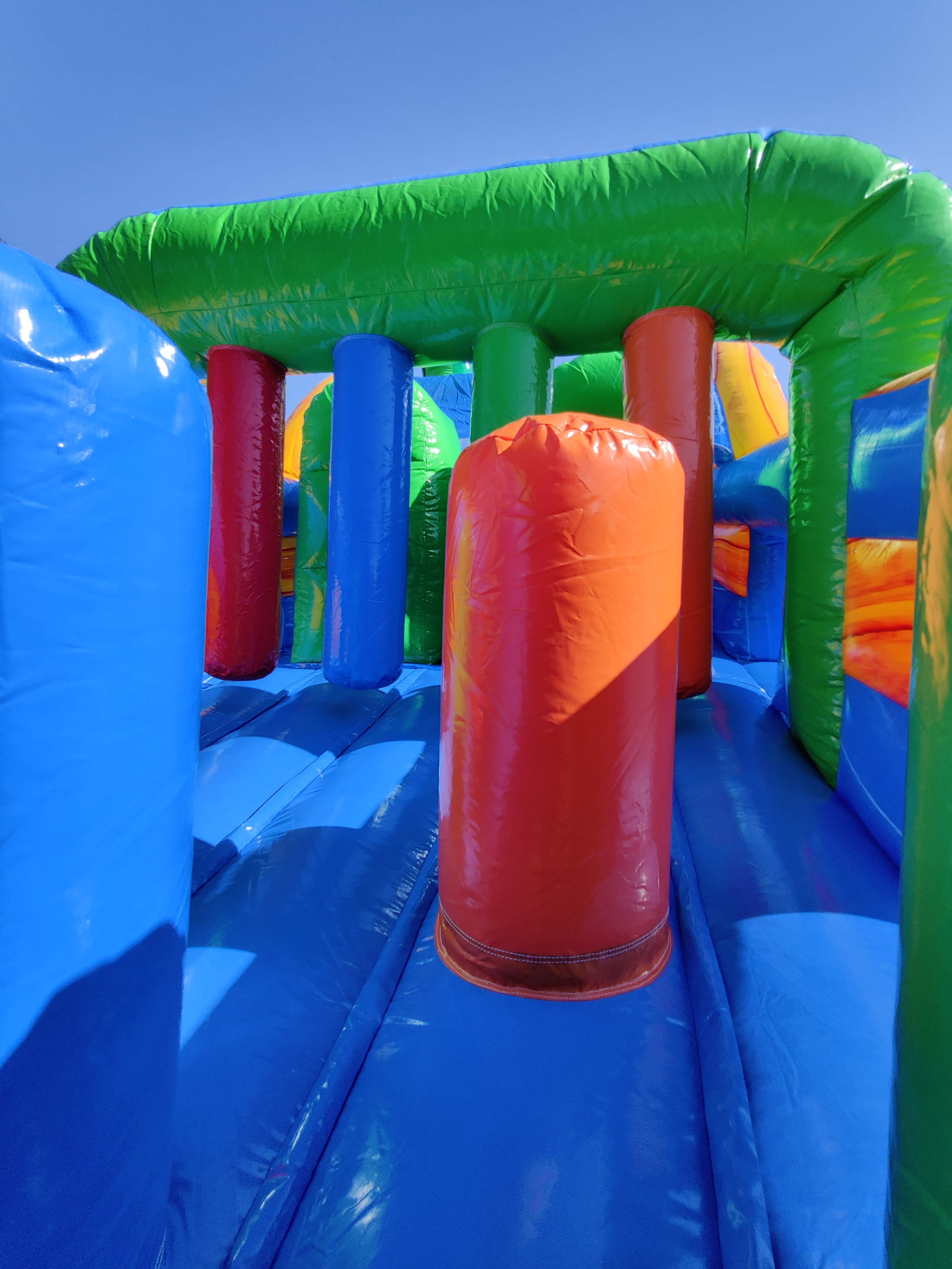 75' Dry Obstacle Course With 2 - 18' Slides. Priced for the whole ...