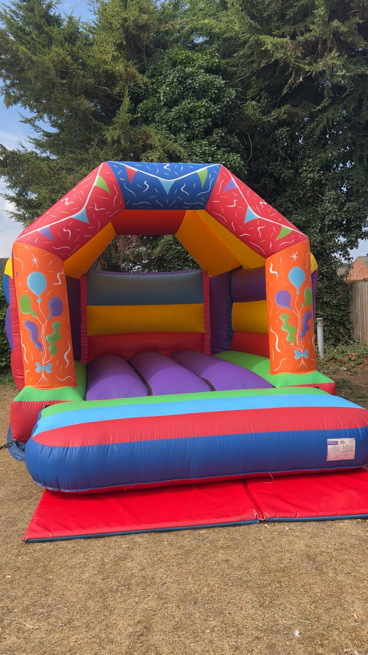 Rainbow Bouncy Castle hire Nottingham -Pie & Kels- no deposit required