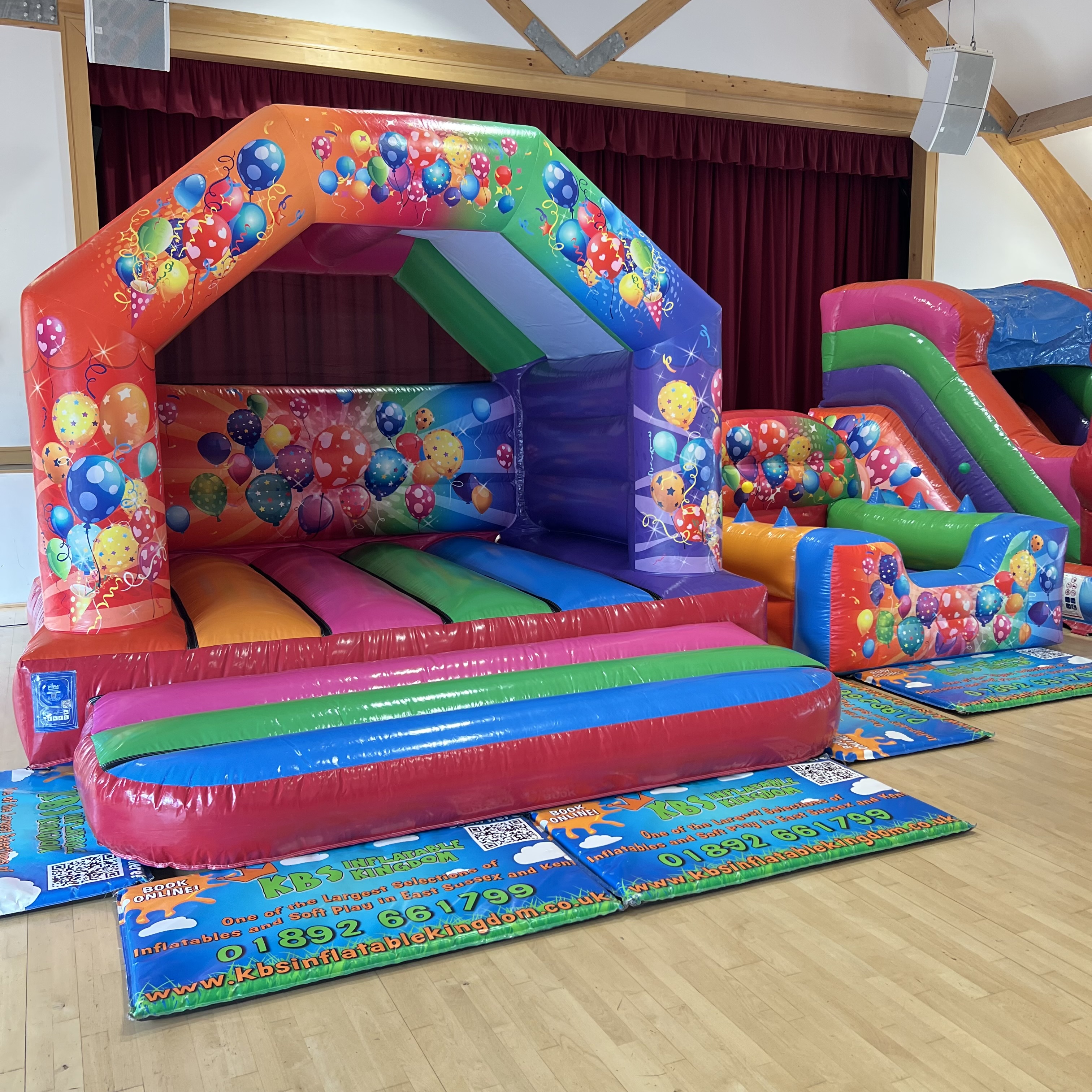 Multi Coloured Party Bouncy Castle + 5ft Platform Slide + Air Juggler ...