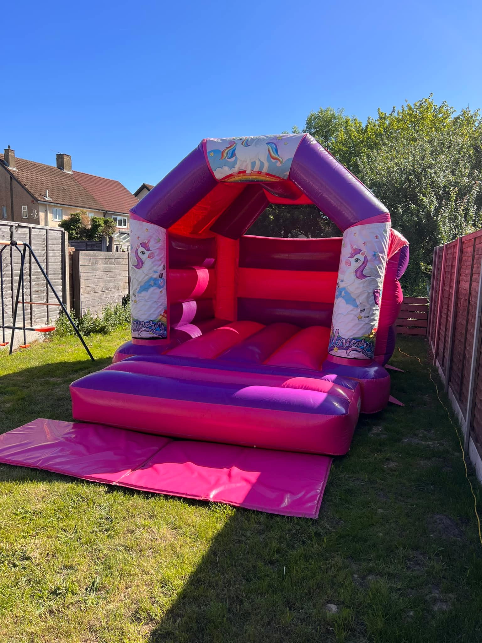 Pink / Purple Unicorn Castle - Inflatables Hire in London, greenwich ...