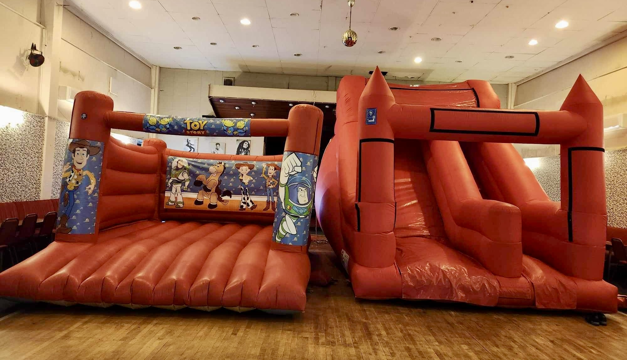 10ft Platform Red Slide Hire Monmouthshire | Bouncing Dragons Inflatab
