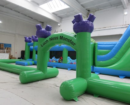 Loch Ness Monster Obstacle Course - Bouncy Castle Hire | Disco Dome ...