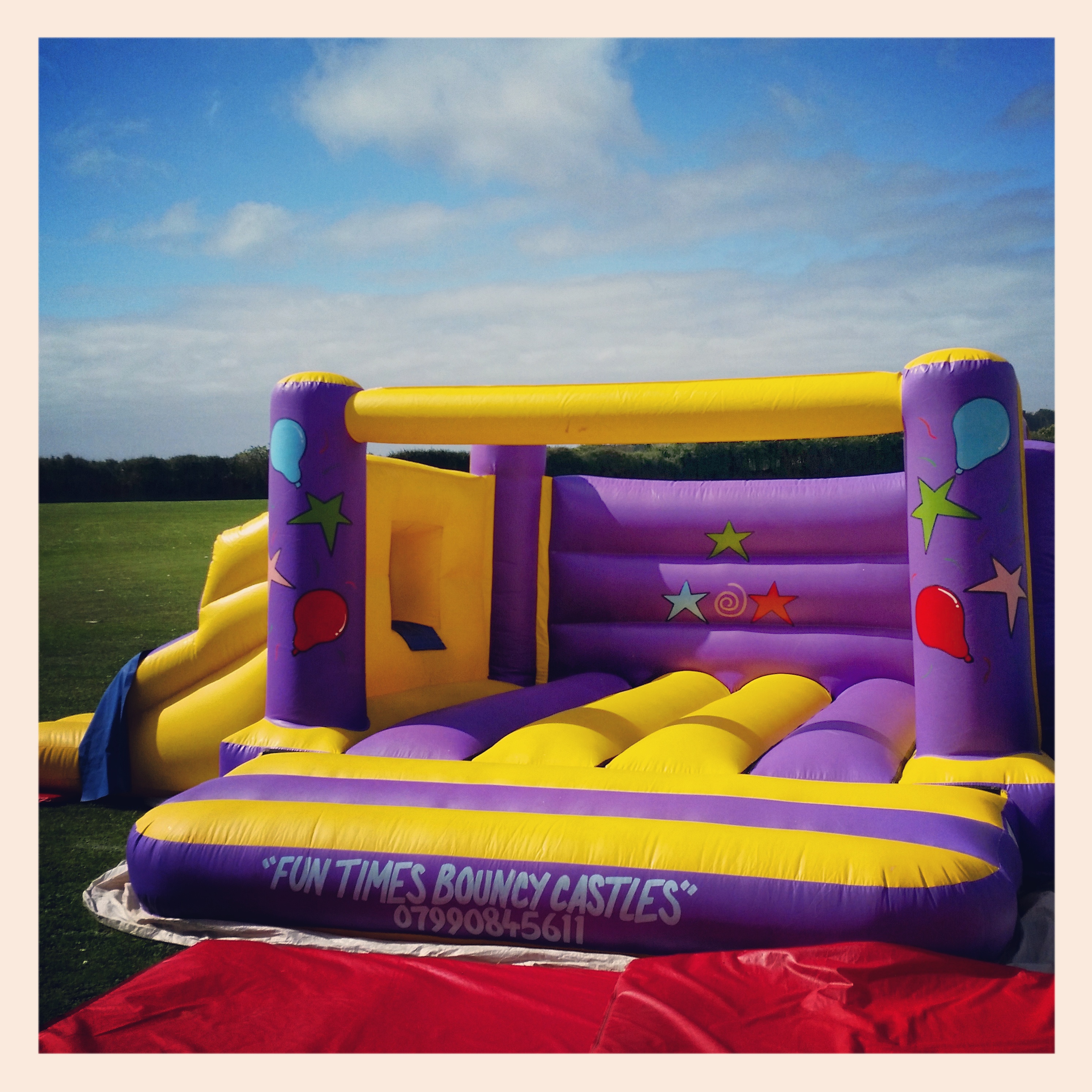 Pink & Yellow Bounce & Slide Bouncy Castle Hire Swansea