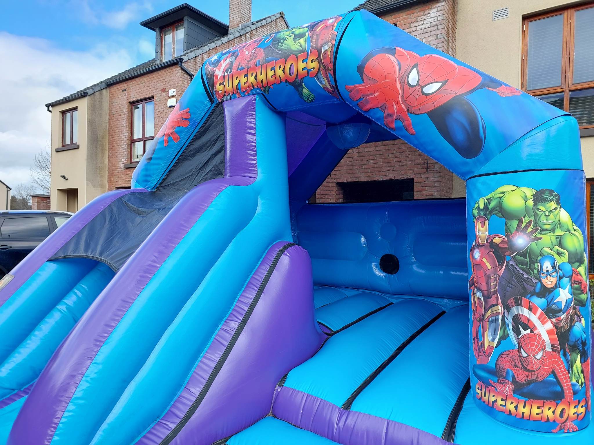 16ftx12ft SuperHeroes Bouncy Castle with Slide - Bouncy Castle Hire ...