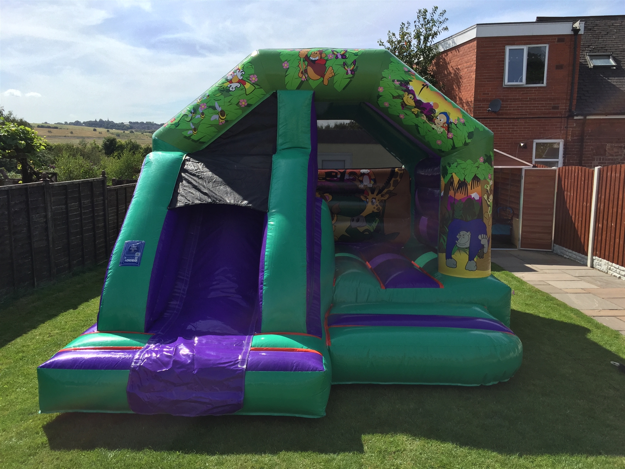 Jungle Bouncy castle with slide hire - South Yorkshire