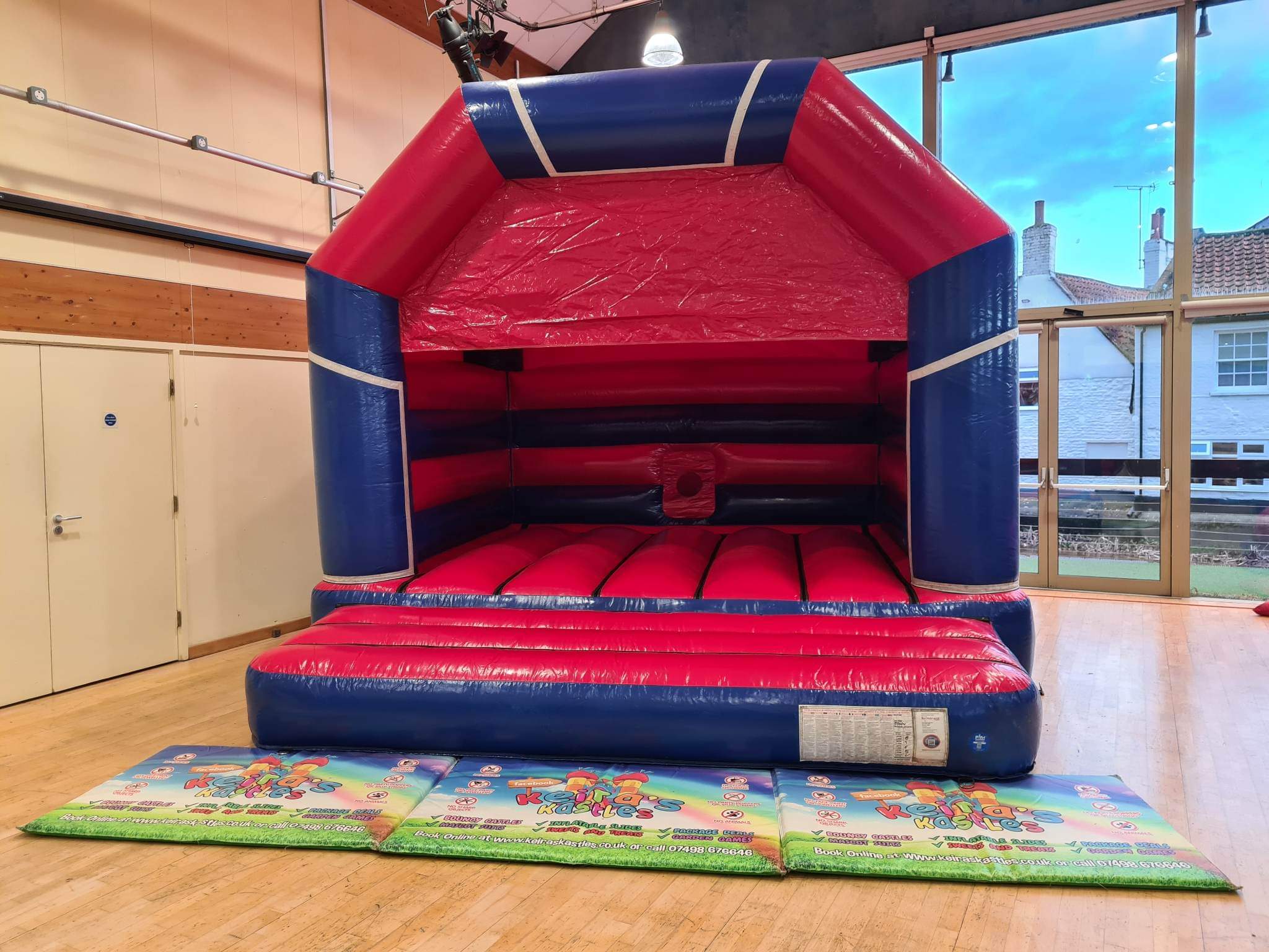 Red and Blue Adult Bouncy Castle - Bouncy Castle Hire in North ...