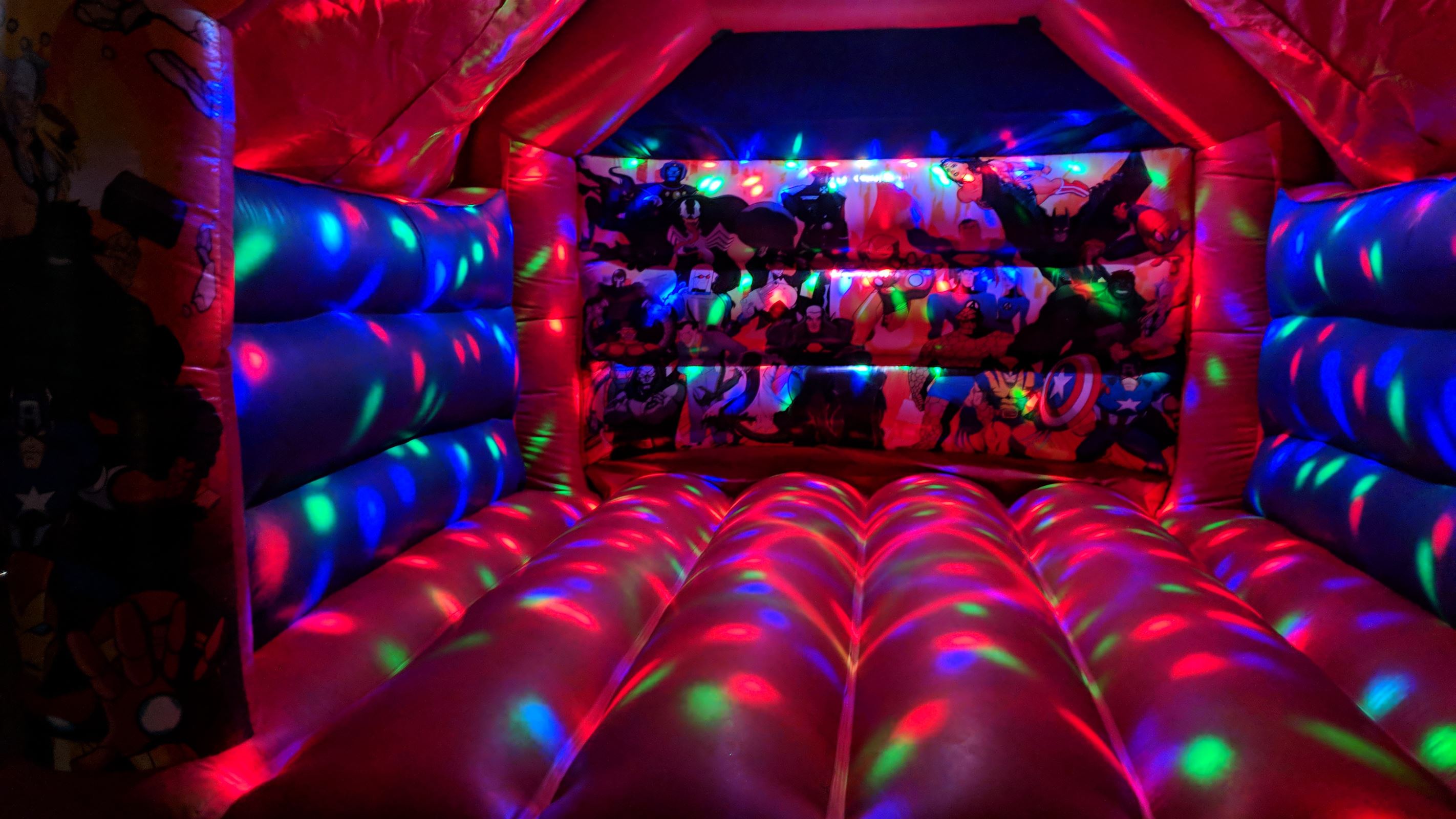 Superhero Disco Bouncy Castle Hire - Born 2 Bounce