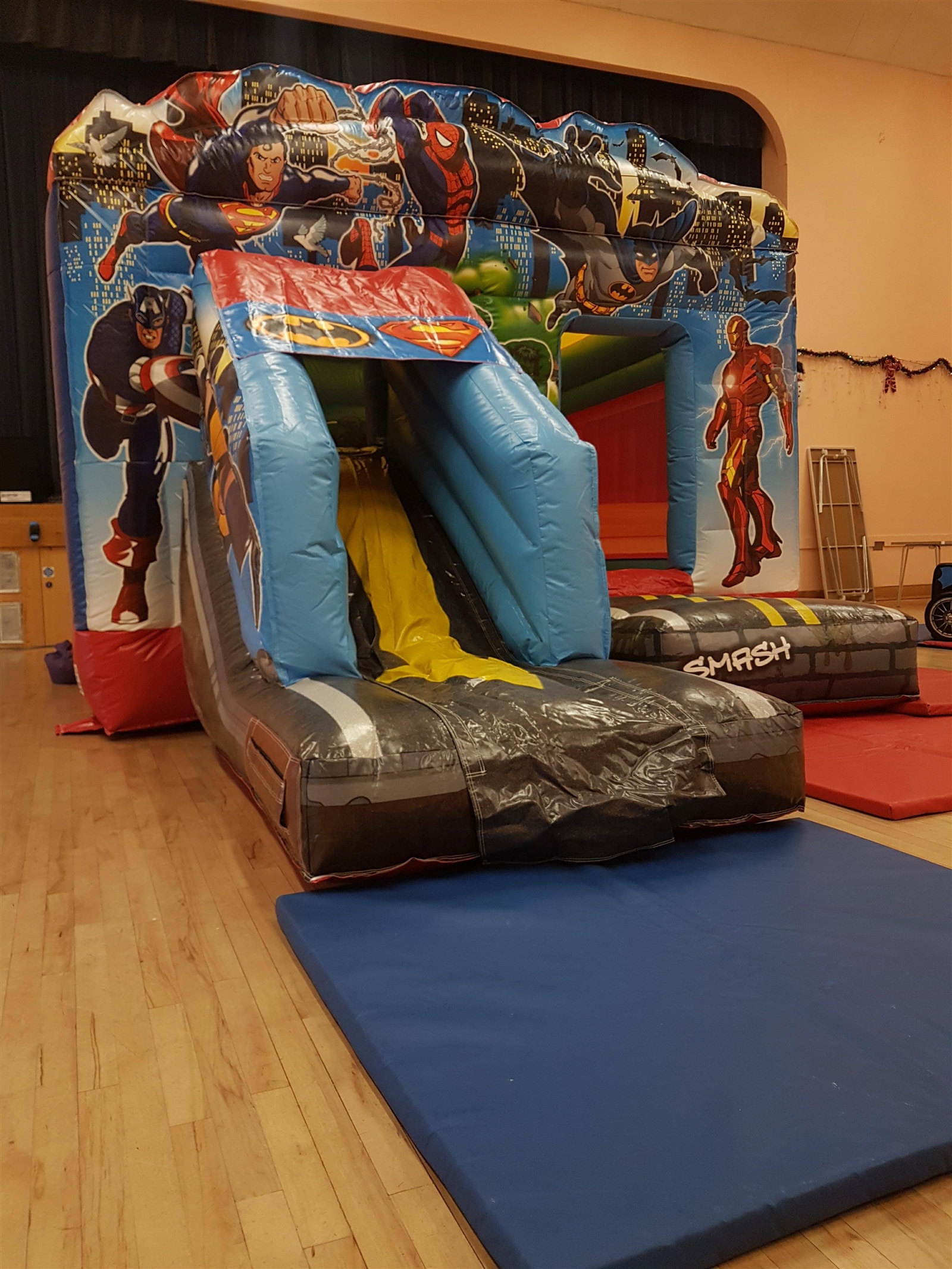 Premium Super Hero Slide Castle, Quality Inflatables from Kidsplay